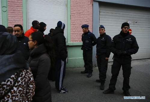 Paris attacks suspect arrested in Belgium, police operation still ...