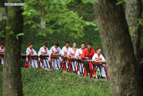 Teenagers play Chinese instrument Zheng in China's Hubei - Global Times
