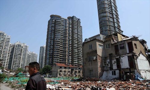 Living in run-down houses surrounded by high-end condos, Shanghai ...