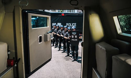 Blockbuster-like police posters go viral online - Global Times