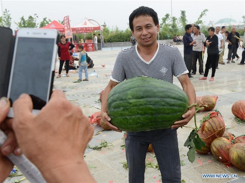 Watermelon eating competition attracts visitors, participants - Global ...