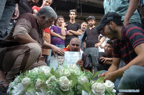 People mourn victims of car bombing attacks in Baghdad - Global Times