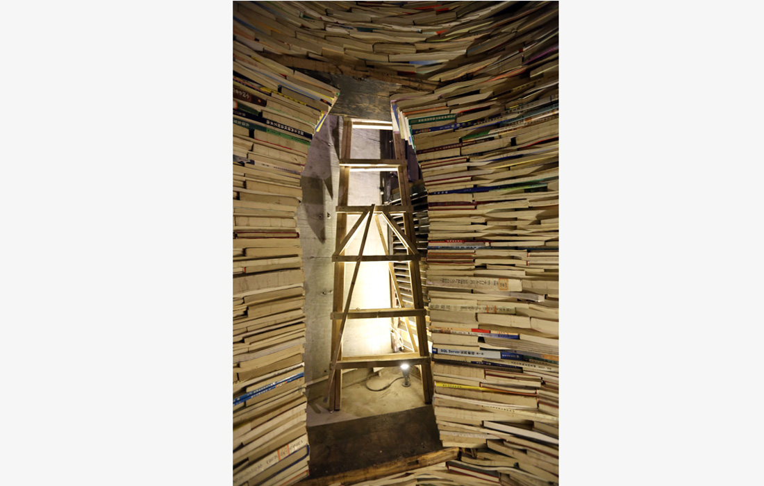 6-meter-tall "book well" a mother's monument to the need for critical ...