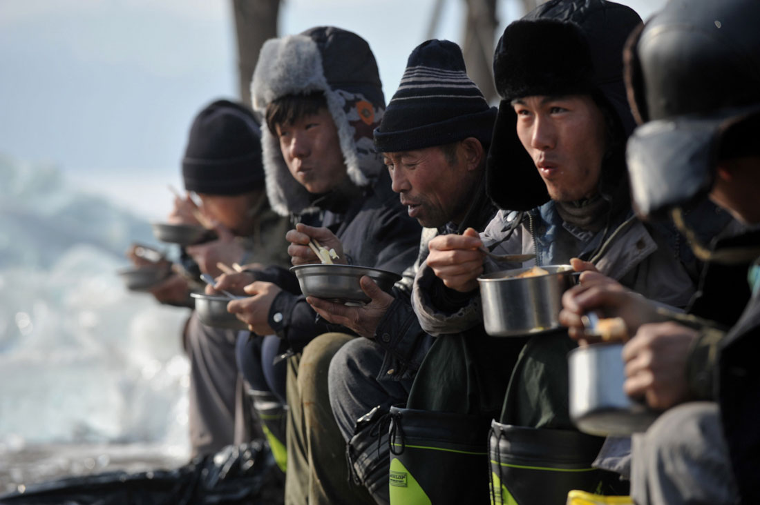 Dancing on a frozen lake: ice diggers toil in frigid conditions ...