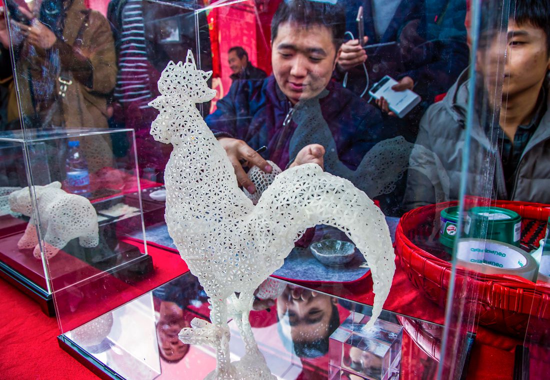 Chinese artist uses rice grains to create awe-inspiring artworks ...