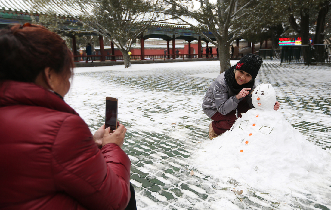 Cold front brings late winter snow across northern China - Global Times