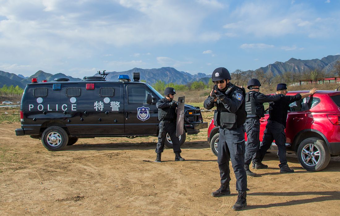 Chinese special police take action snaps to mark International Workers ...