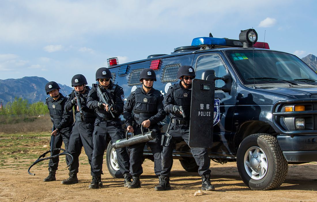 Chinese special police take action snaps to mark International Workers ...