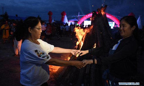 Traditional God-of-fire sacrifice festival marked in Xunke, NE China ...