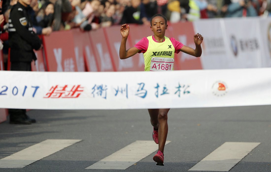 More than 9,000 run East China city’s first full marathon - Global Times