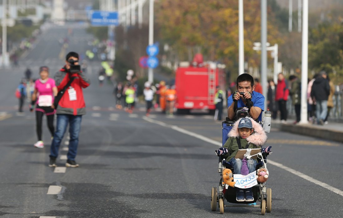 More than 9,000 run East China city’s first full marathon - Global Times