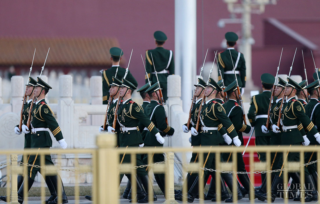 Chinese national flag guard unit of armed police raises flag for last ...