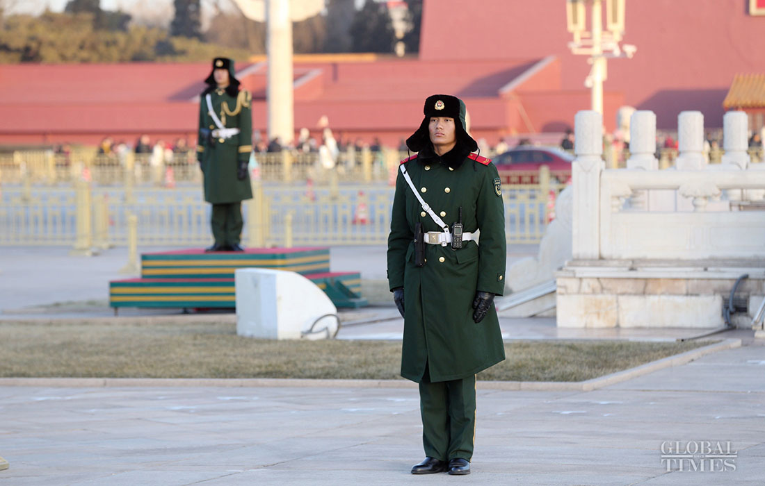 Chinese national flag guard unit of armed police raises flag for last ...