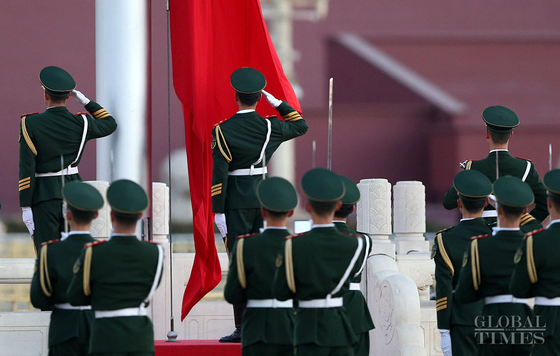 Chinese national flag guard unit of armed police raises flag for last ...