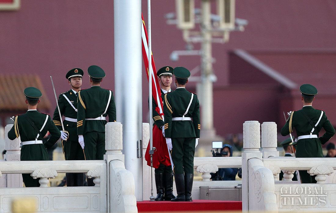 Chinese national flag guard unit of armed police raises flag for last ...