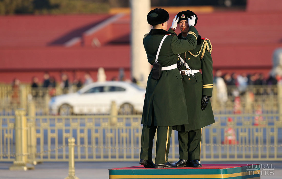 Chinese national flag guard unit of armed police raises flag for last ...