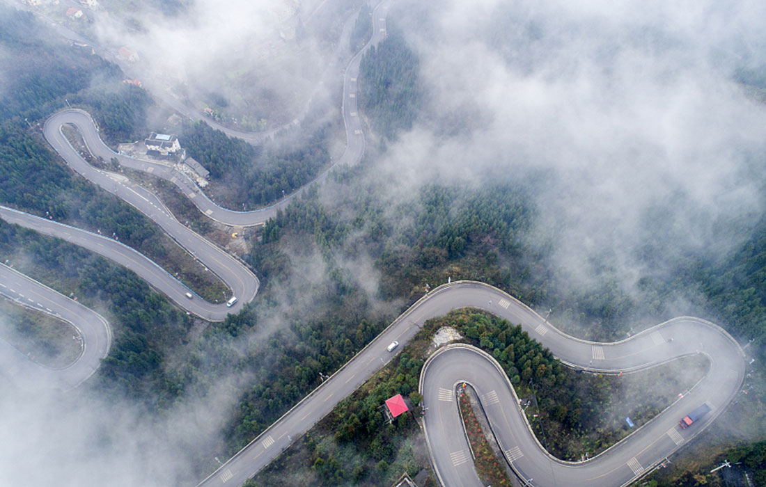 Twisty mountain highway makes a picturesque drive through SW China’s ...