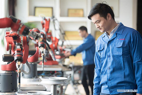 Robots help boost productivity in E China's Zhejiang - Global Times