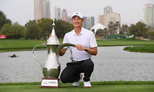 Emerging Chinese golfing star Li beats McIlroy to claim Dubai title ...