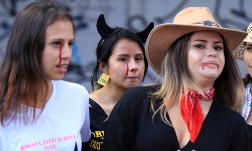 Animal rights activists protest bullfighting in Colombia - Global Times