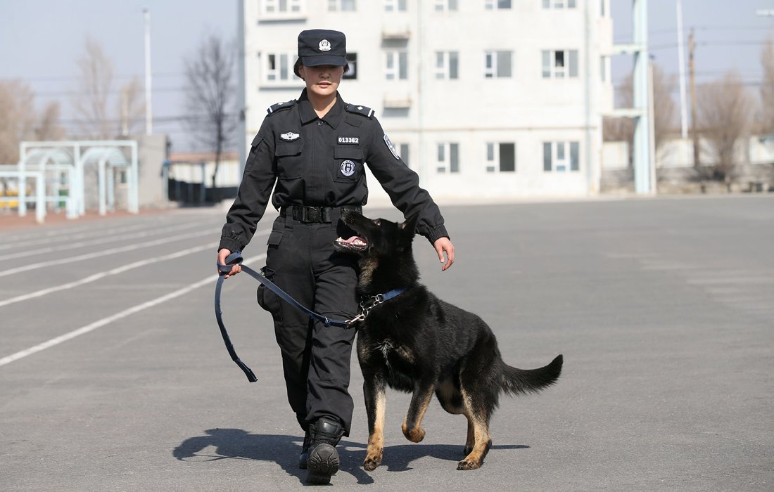 A female special police keeps to the front line against terror with a ...