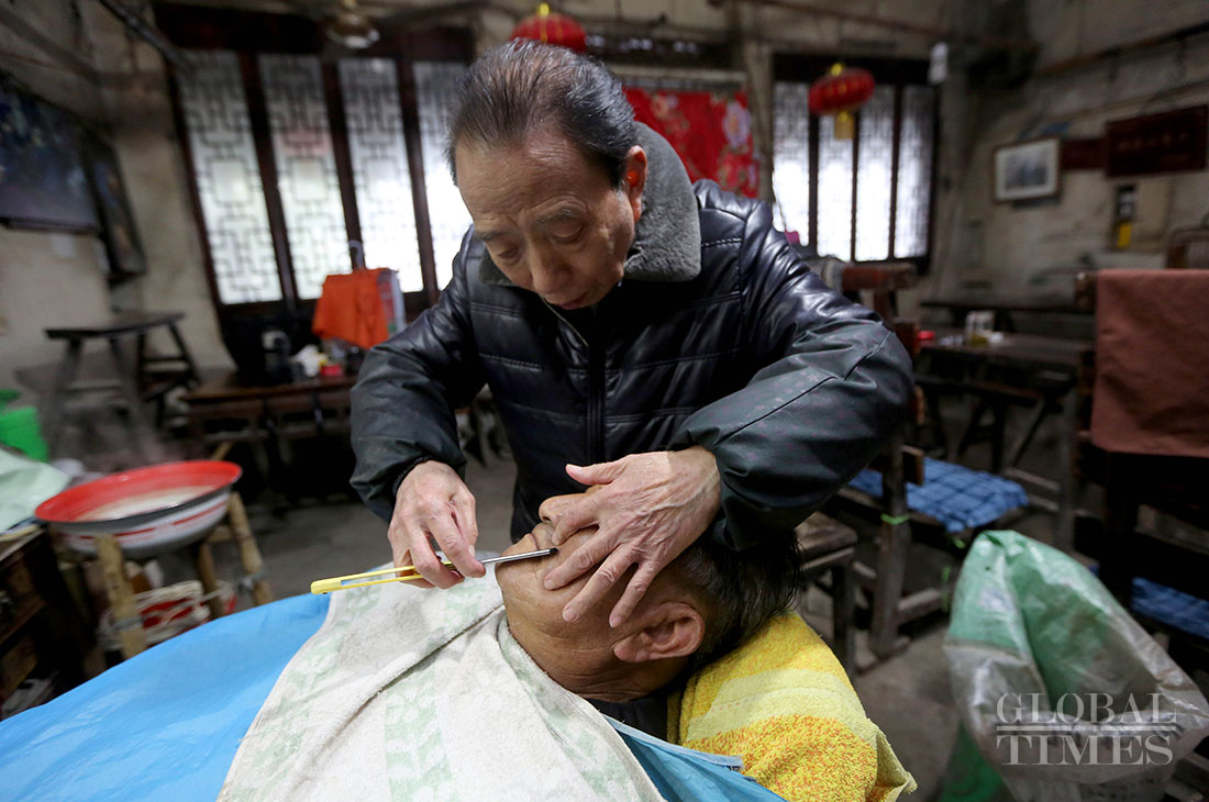 76-year-old barber still sharp for China’s ‘haircutting festival ...