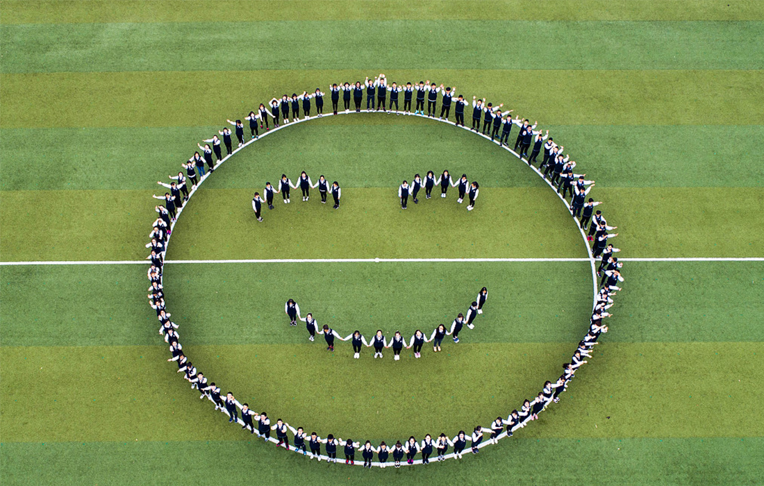 People make 'smiling faces' for World Smile Day in Jiangsu - Global Times