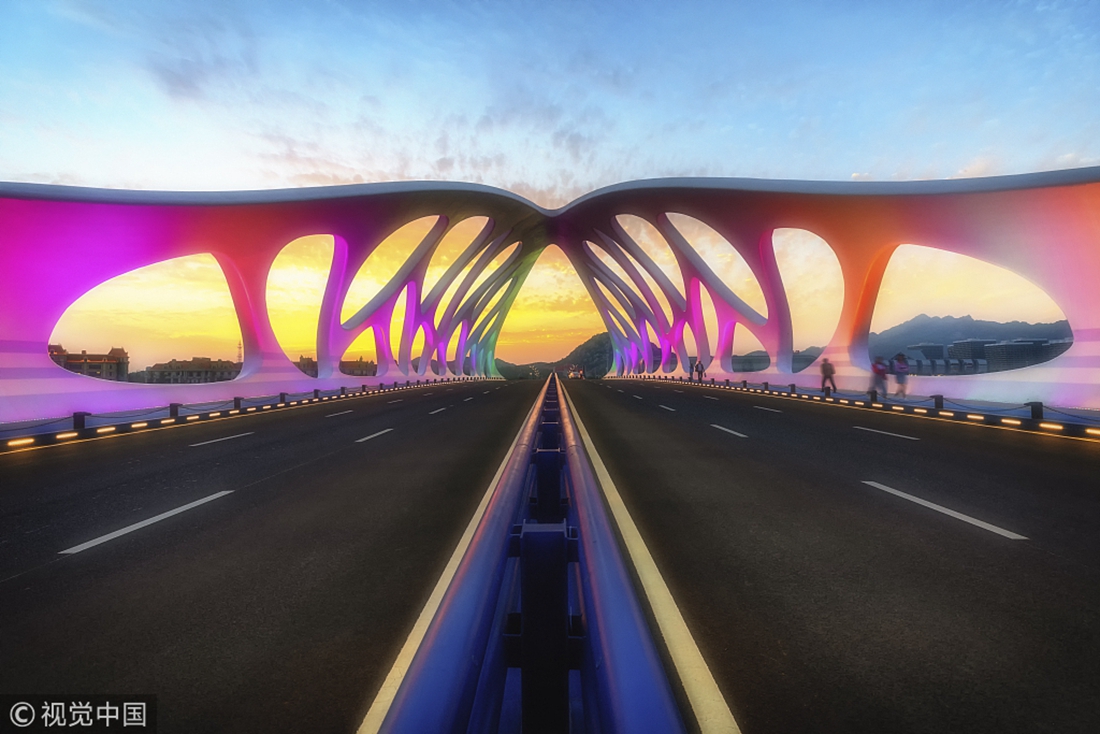 Colors light up the coral-shaped bridge in E China’s Qingdao - Global Times