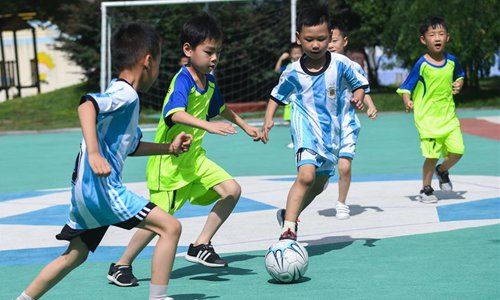 Children enjoy fun of playing football at kindergarten in E China's ...