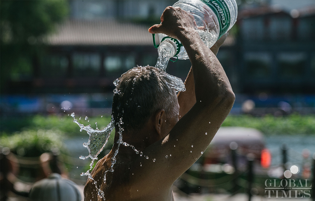 Beijing issues yellow alert as heat wave hits city - Global Times