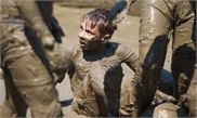 Children play football in mud in Gradiste, Croatia - Global Times