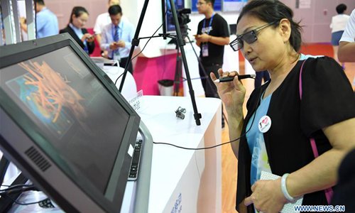 High-tech exhibits attract visitors at 15th China-ASEAN Expo - Global Times