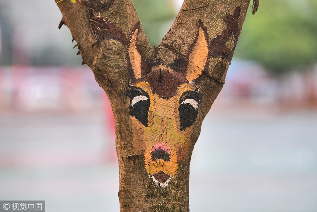 Animal paintings appear on trees in S China’ s Guangxi - Global Times
