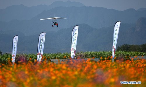 Tourists have fun at flying camp in east China's Zhejiang - Global Times
