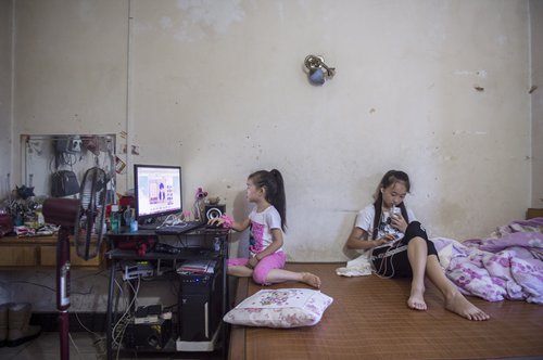 Left-behind children plagued by phone addiction, grades suffer - Global ...