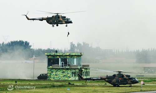 Helicopters shoot flares for concealment - Global Times