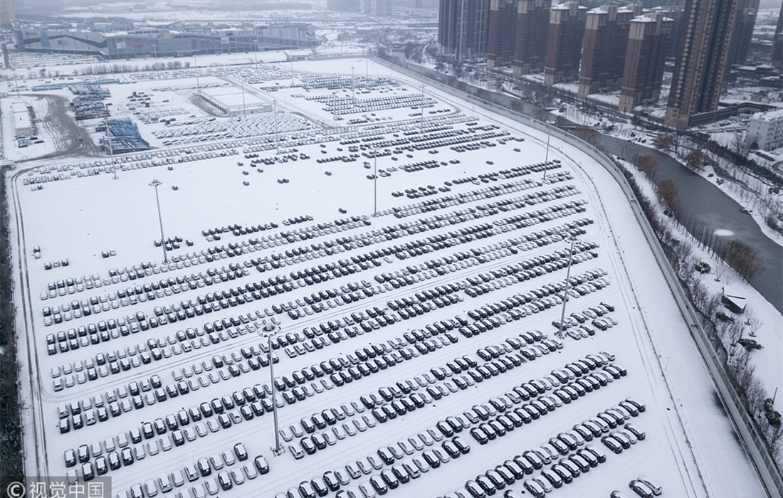 Snowfall creates piano key illusion with vehicles - Global Times
