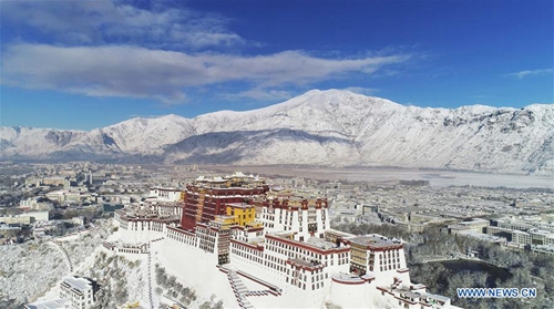 Lhasa of SW China's Tibet witnesses first snow - Global Times