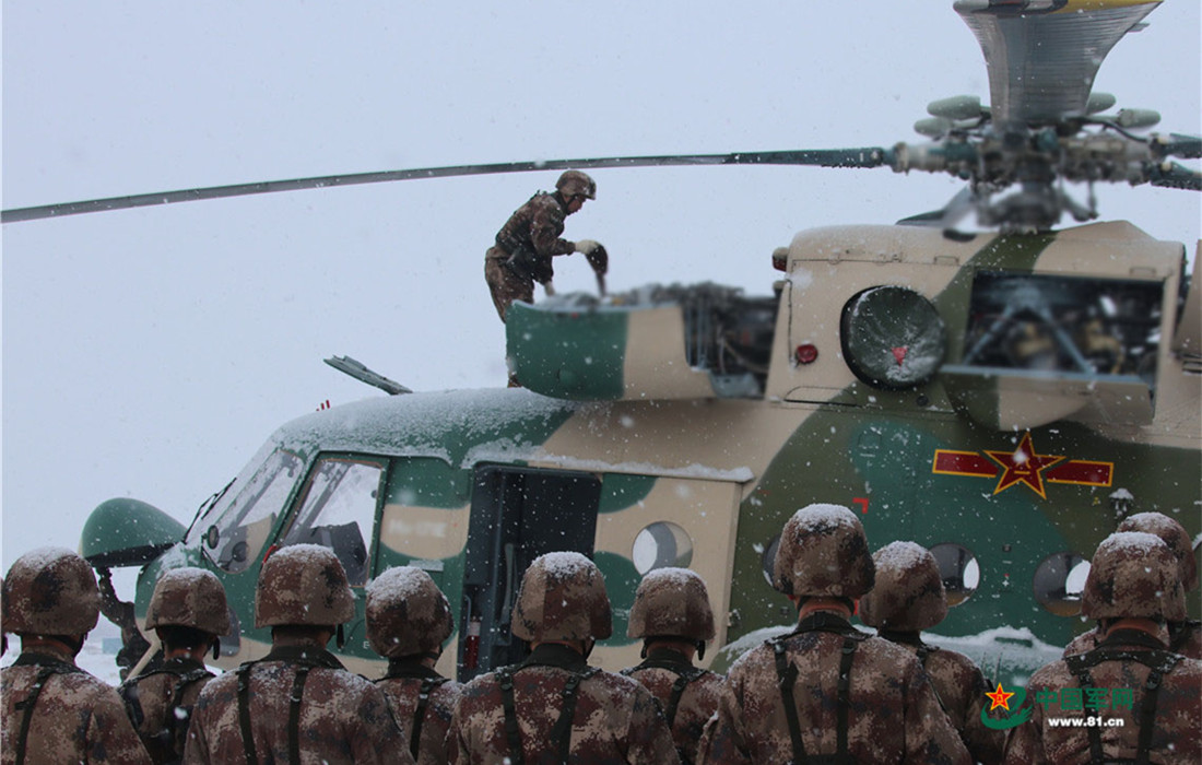PLA Xinjiang troops kicks off exercises in snow - Global Times