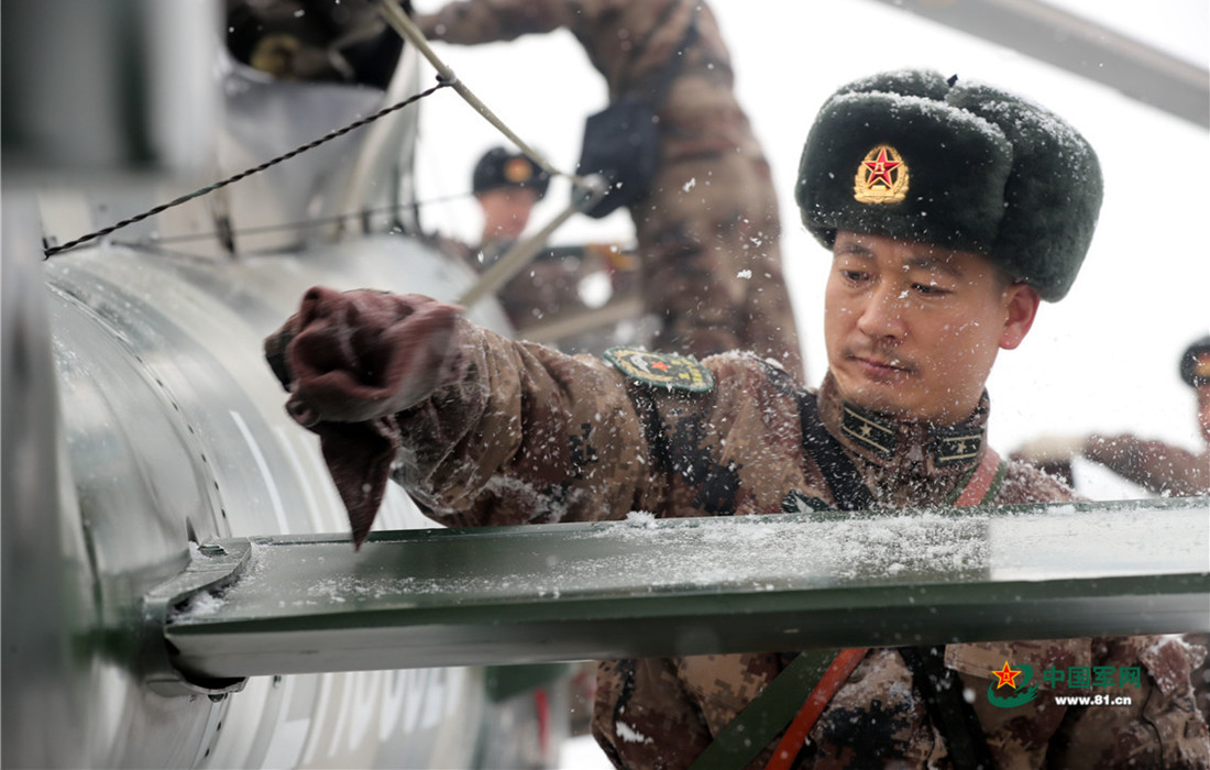 PLA Xinjiang troops kicks off exercises in snow - Global Times