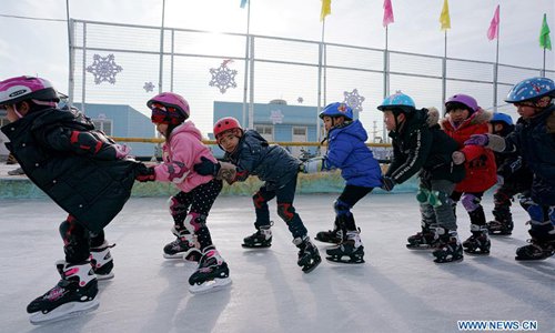 Students participate in skating training session in Yanqing District of ...