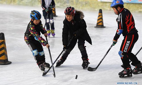 Students participate in skating training session in Yanqing District of ...