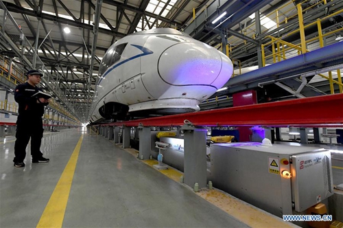 Robots employed in China's railway system during Spring Festival travel ...