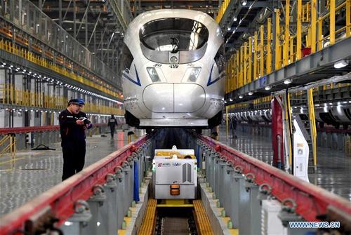 Robots employed in China's railway system during Spring Festival travel ...