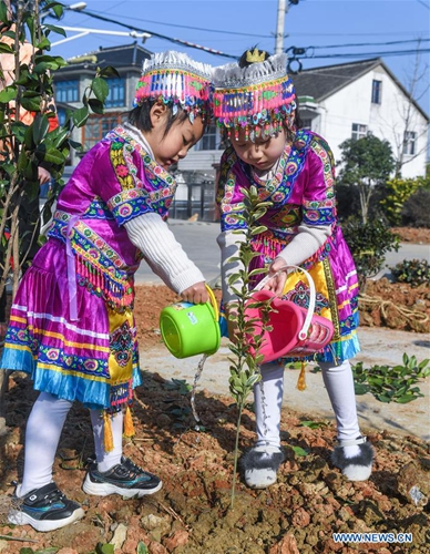 Children of different ethnic groups greet Arbor Day in E China's ...