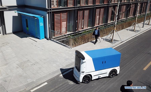 Unmanned express delivery vehicle put into service at Xiongan citizen ...