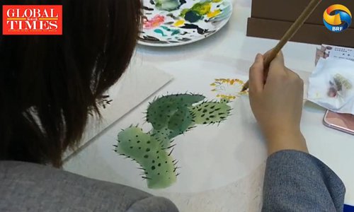 Participants practicing Intangible Cultural Heritage drawing at the 2nd ...