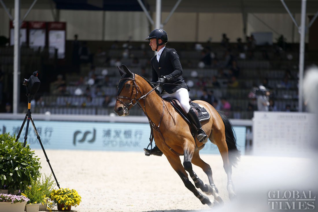 Riders from around the world compete at the Shanghai Longines Global ...