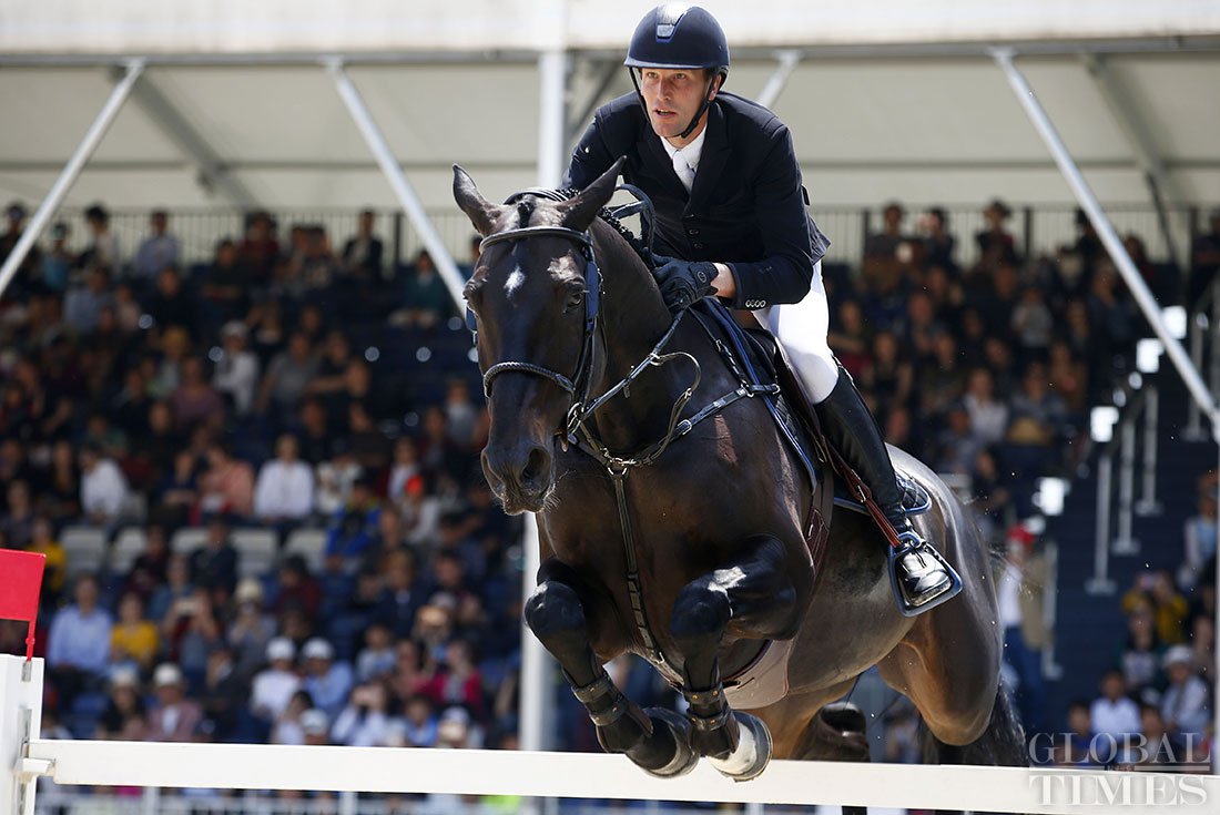 Riders from around the world compete at the Shanghai Longines Global ...