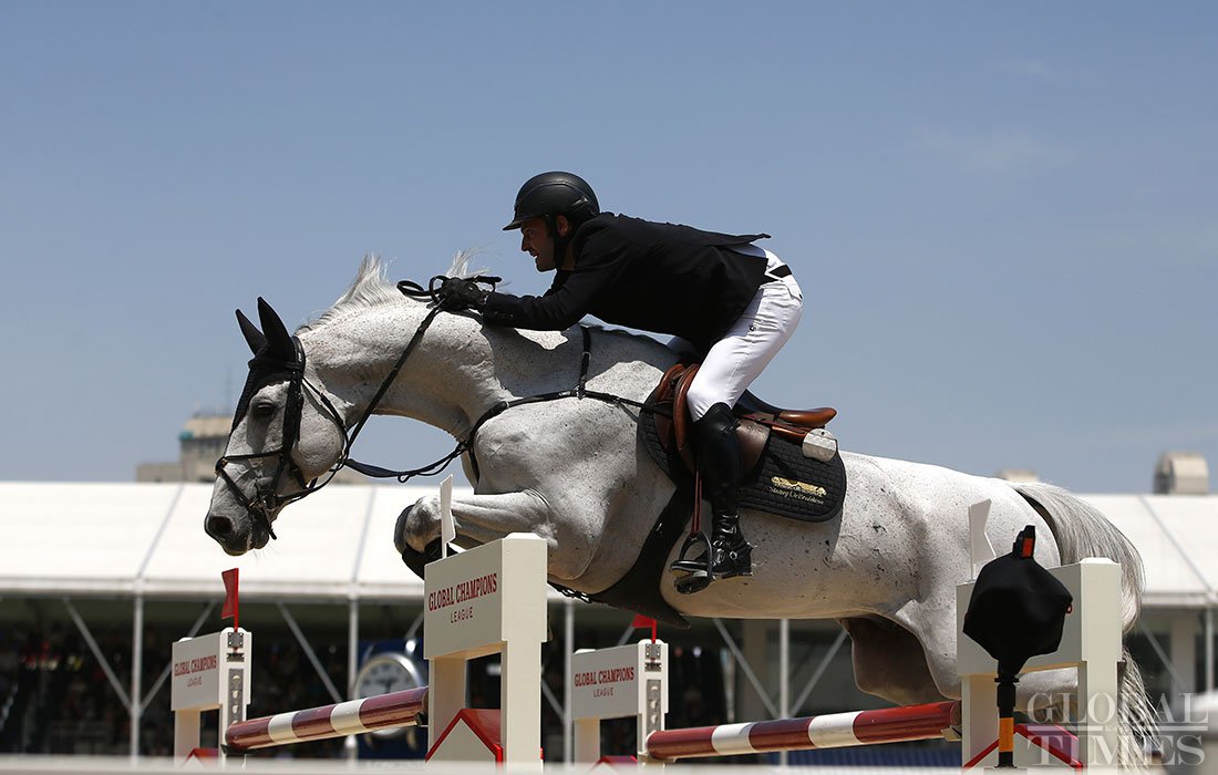 Riders from around the world compete at the Shanghai Longines Global ...
